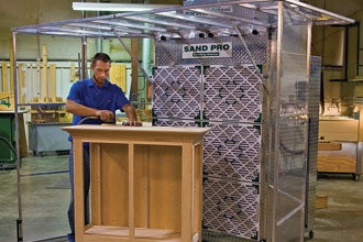 SandMan rolls out its new sanding booth | Woodshop News Magazine